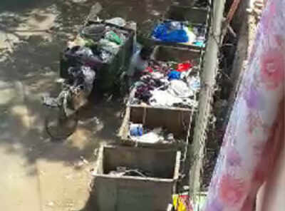 Dustbins overfilling - Times of India