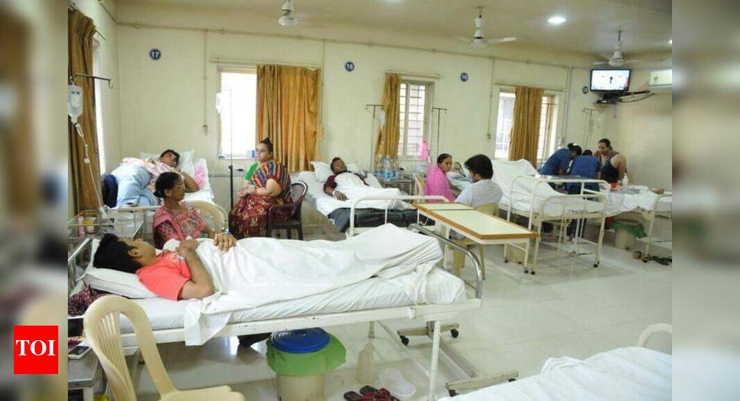 City hospitals overflowing with patients | Surat News - Times of India