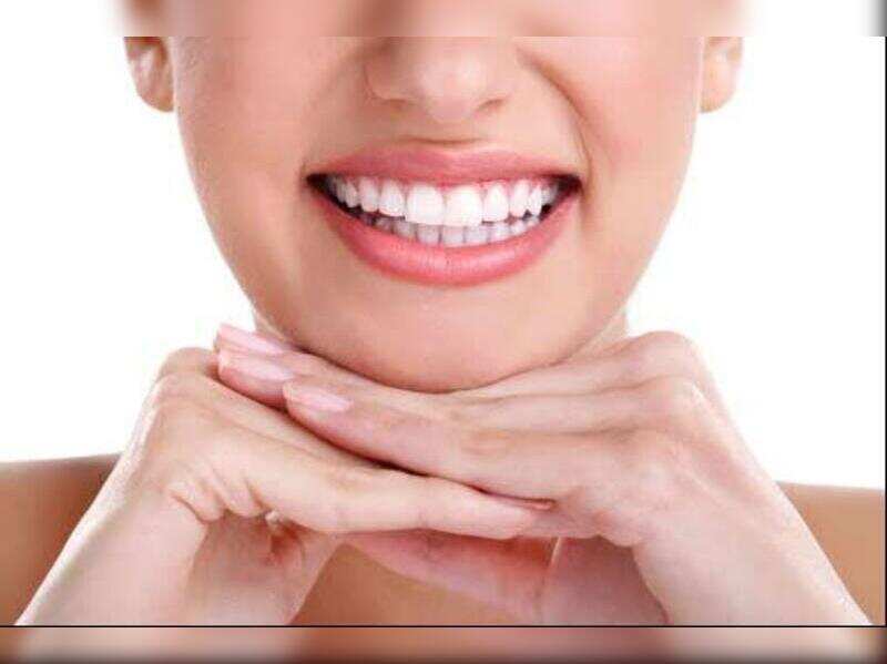 Faking smile won't make you happy - Times of India