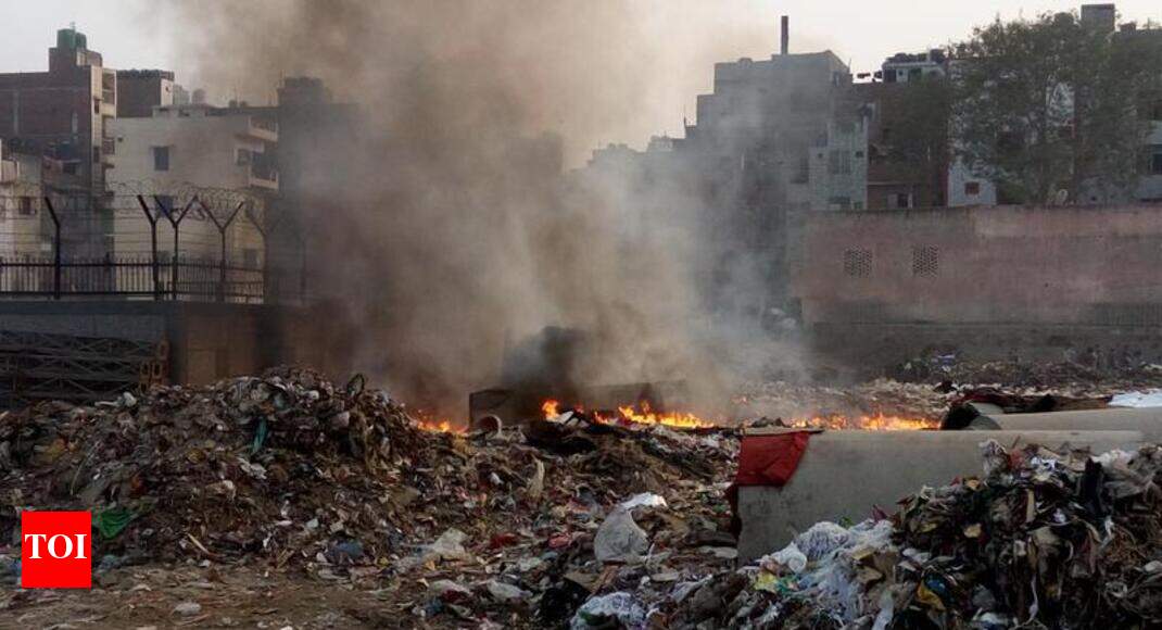 Brazen waste burning in east Delhi’s New Seelampur - Times of India