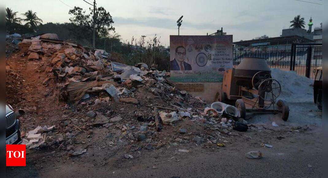 Filth surrounds football stadium - Times of India
