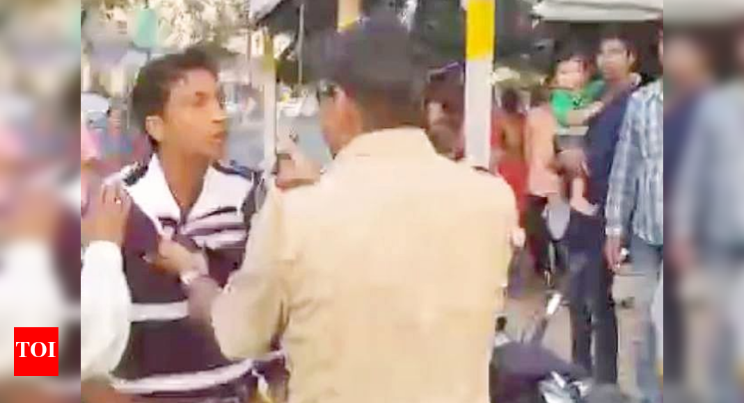 Policeman Assaulted Man: Police officer caught on cam jumping ATM queue ...