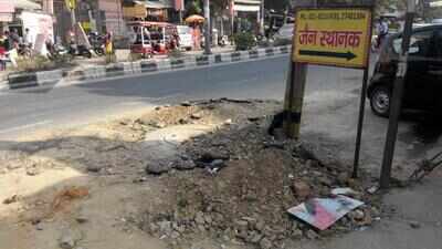 Road dug up, debris not cleared - Times of India