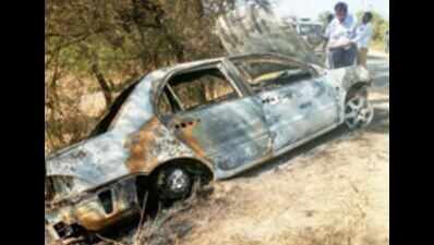 Charred body found in car near Chiloda | Ahmedabad News - Times of India