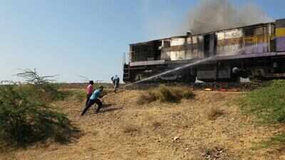 Passenger train engine catches fire | Ahmedabad News - Times of India