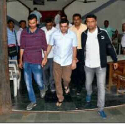 Main accused in Rs 100 crore land grabbing case surrenders | Rajkot News - Times of India