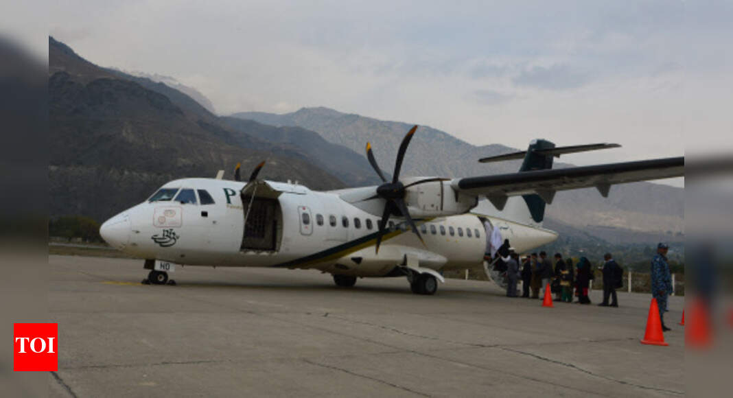 PIA staff sacrifice black goat before ATR plane take-off - Times of India