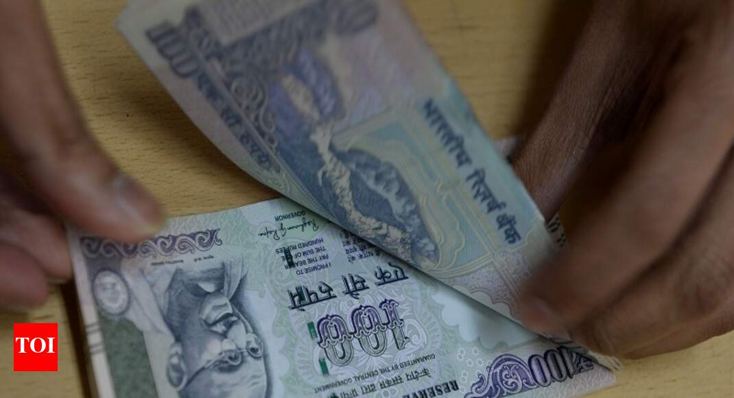 Rupee jumps 18 paise to 67.92 against US dollar - Times of India