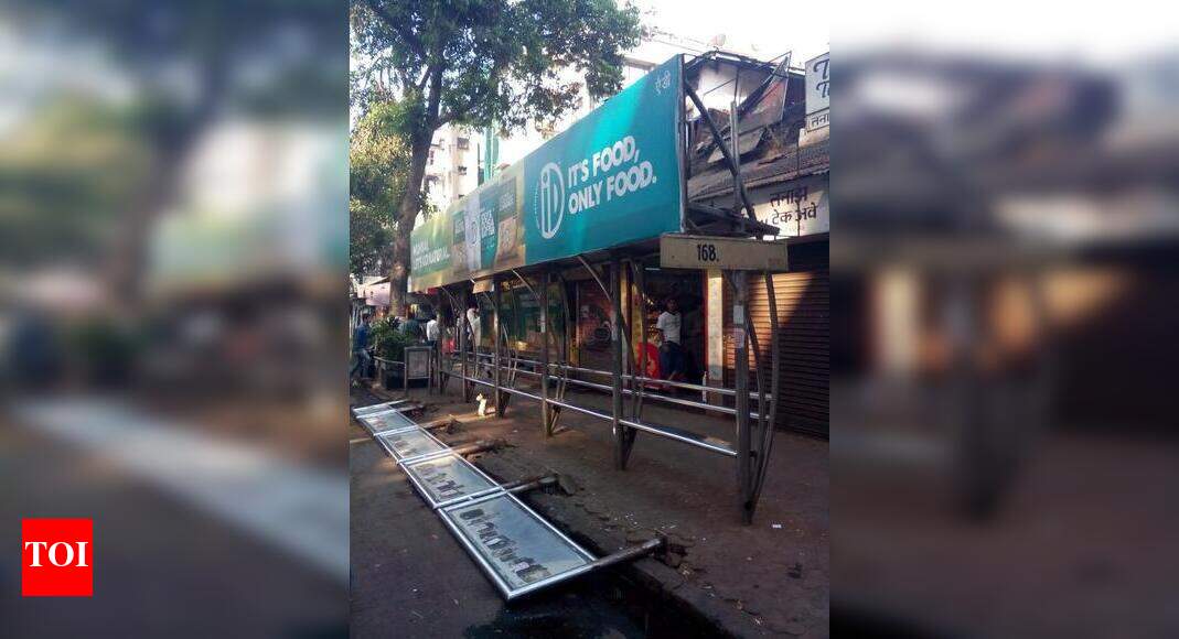 Bus stop railings down - Times of India