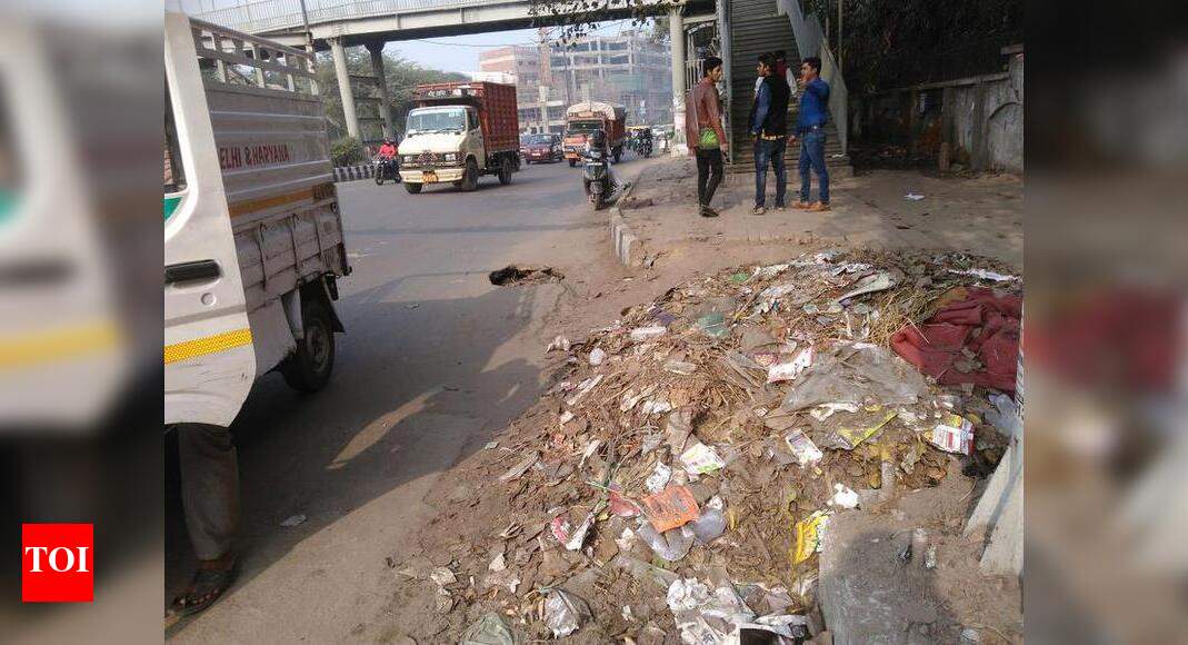 Pothole, debris, garbage - Times of India