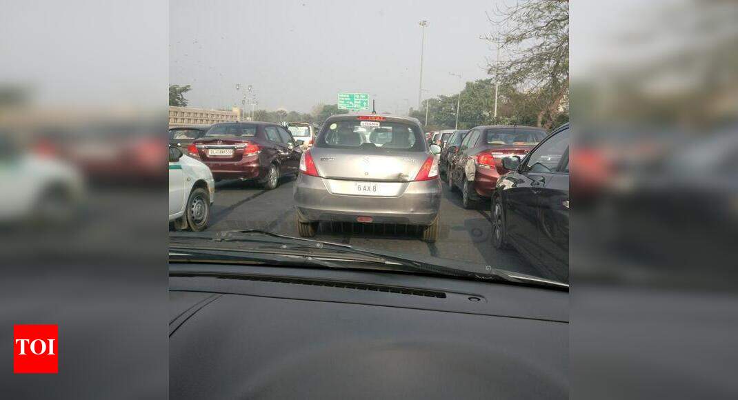 Car with broken numberplate - Times of India