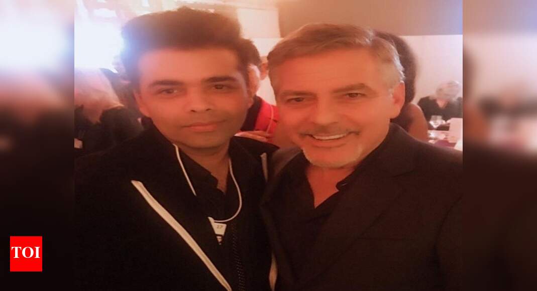 Karan Johar poses with George Clooney at World Economic Forum | Hindi ...