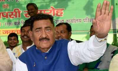 Raghunath Jha, son Ajit Kumar Jha return to Rashtriya Janata Dal ...