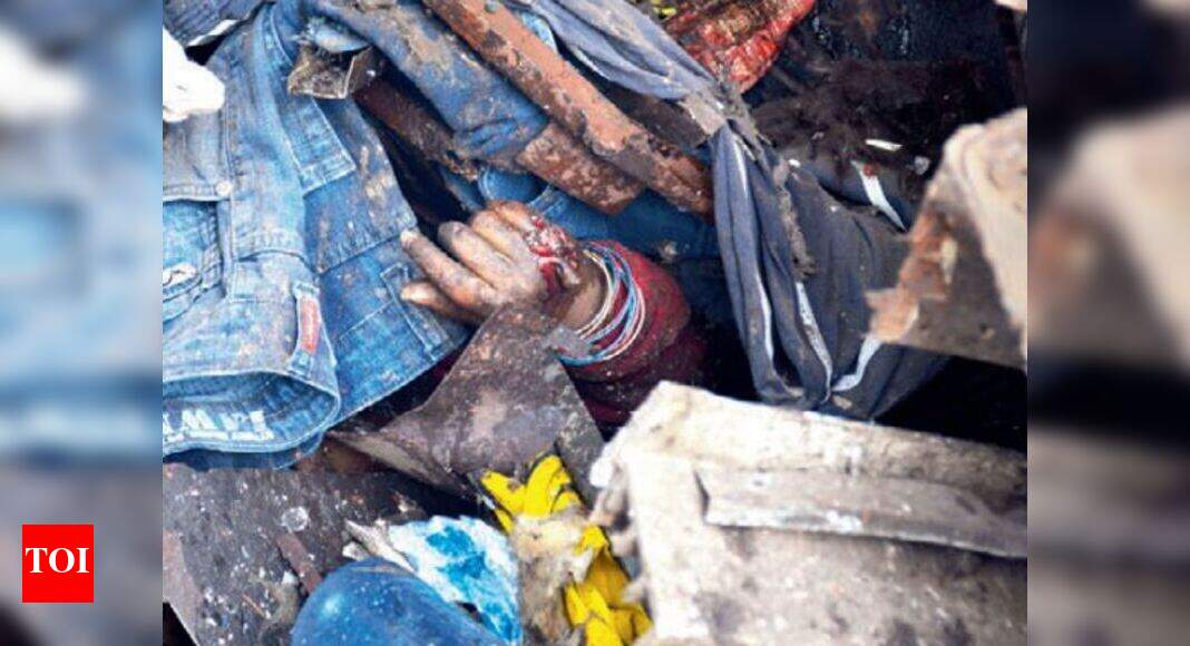 Kin lift shrouds for sign of own amid mangled heap of bodies | Visakhapatnam News - Times of India