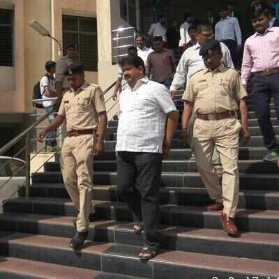 Millionaire cop Prakash Patil surrenders in court | Surat News - Times ...