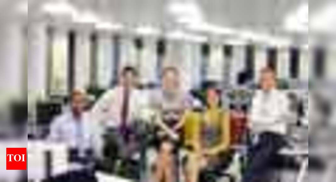 More expats returning home to earn a living - Times of India