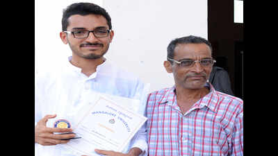 Writing For Newspapers And Magazines: Auto driver's son wins gold medal ...