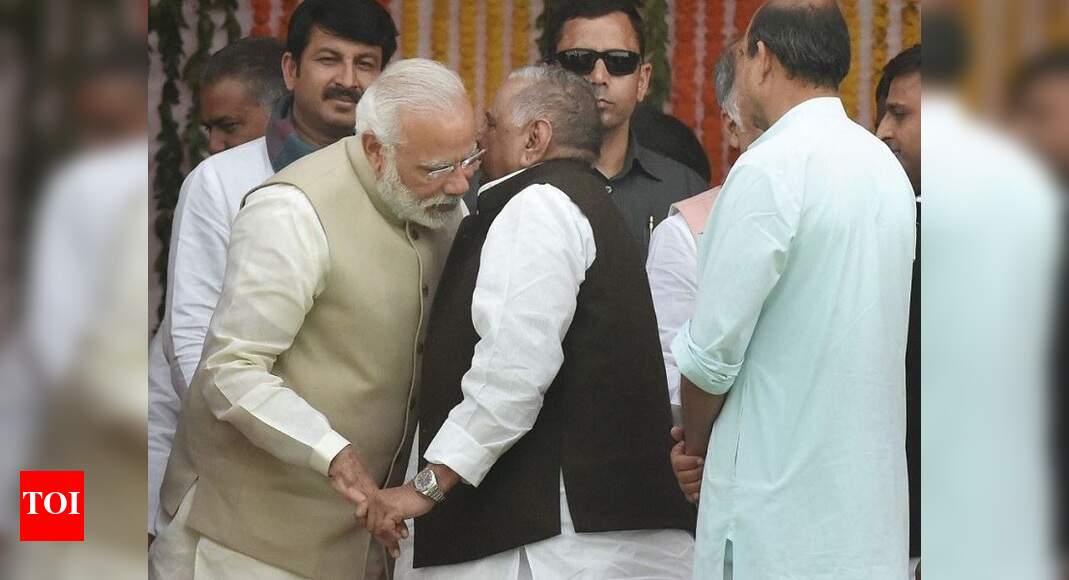 PM Modi: PM Narendra Modi all ears to Mulayam, pats Akhilesh at UP CM's ...