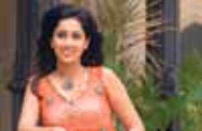 Playing with dogs relaxes Sampada - Times of India