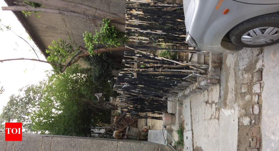 Encroachment in common area of housing society - Times of India