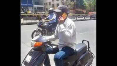 144 motorists caught using phones | Pune News - Times of India
