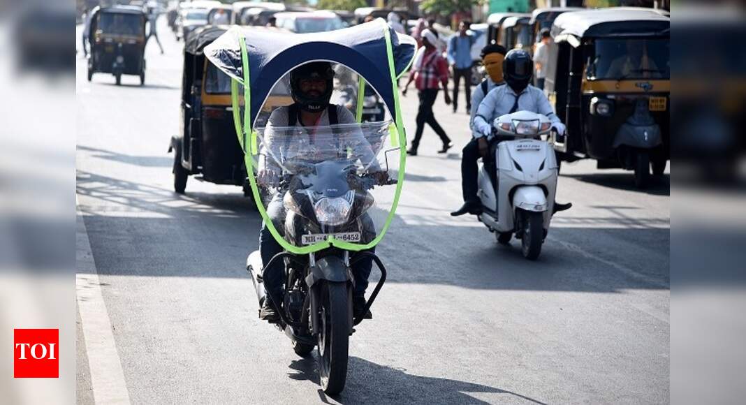 Umbrella: Quirky two-wheeler canopies become the new rage | Nagpur News ...