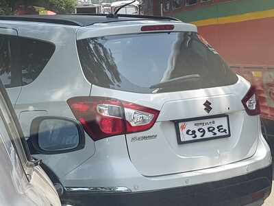 parking in bus stop with Marathi number plates - Times of India