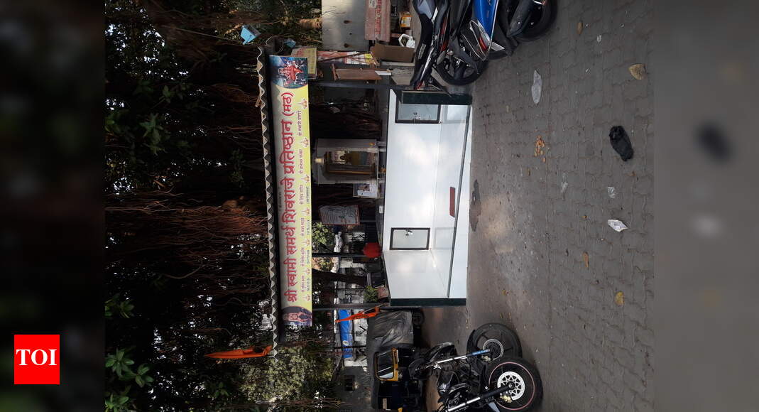 Systematic Encroachment of Road - Times of India