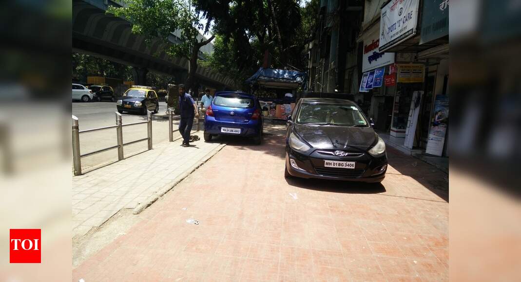 Cars Parked On The Footpath Times Of India
