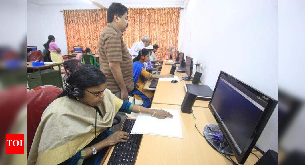 Training for blind school teachers in typing software ...