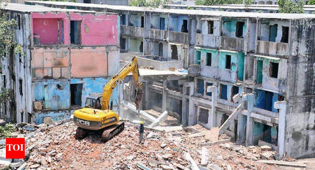 Demolition of Althan tenements begins | Surat News - Times of India