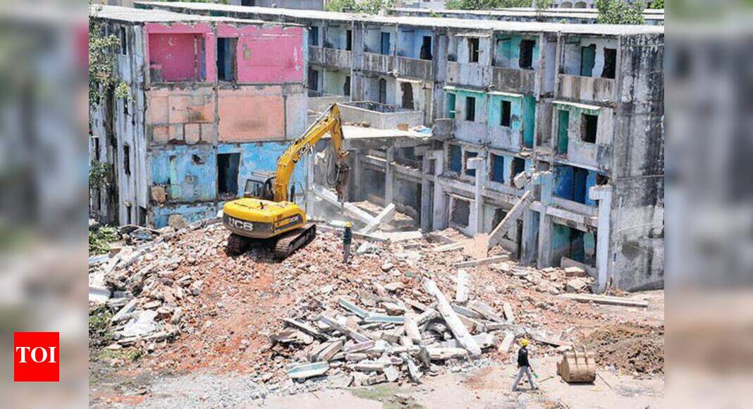 Demolition of Althan tenements begins | Surat News - Times of India