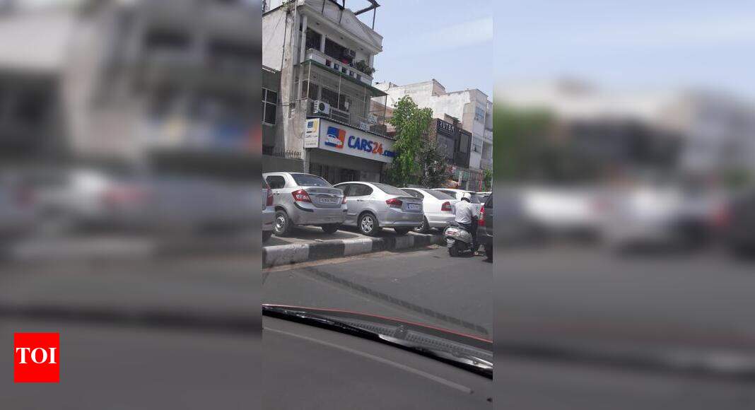 Footpath encroachment at Priya Enclave - Times of India