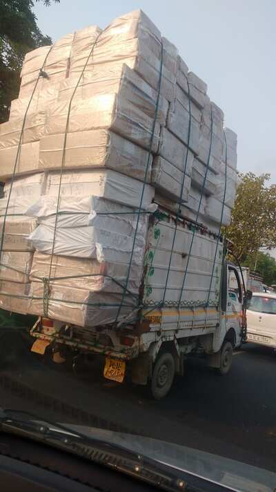 Overloaded commercial vehicles - Times of India