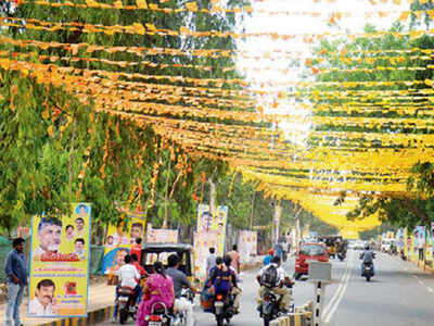 TDP paints Vizag city yellow with flags and banners for 'Mahanadu ...