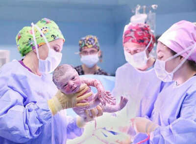 7 beautiful photographs of childbirth - Times of India