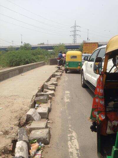 Footpath in bad shape - Times of India