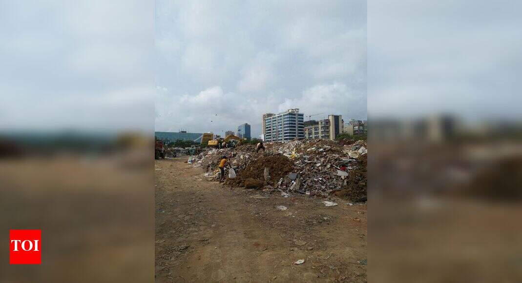 Dumping of debris on Andheri RTO plot touching New - Times of India