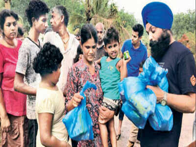 Sikh volunteers help Lanka flood-hit | Chandigarh News - Times of India