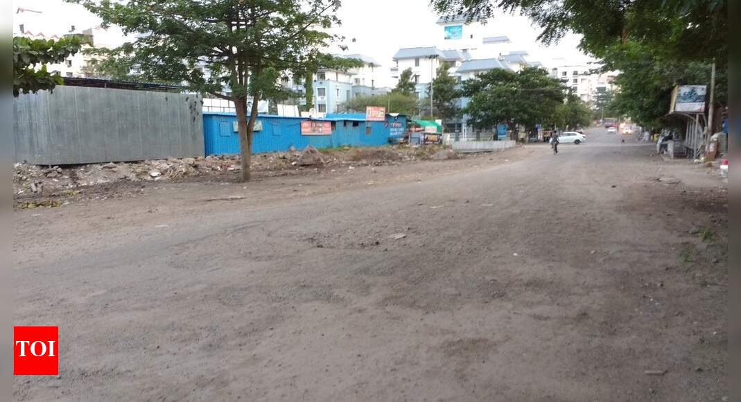 Half-done road - Times of India