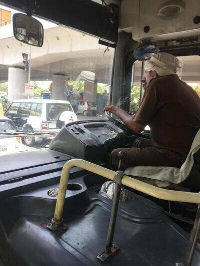 DTC Bus Driver smoking while driving - Times of India