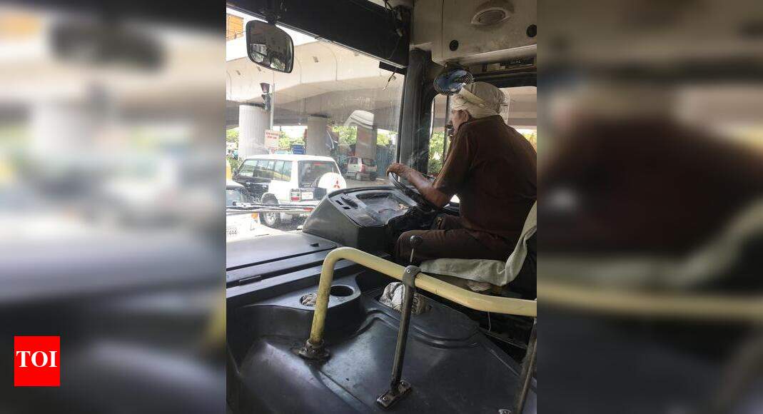 DTC Bus Driver smoking while driving - Times of India