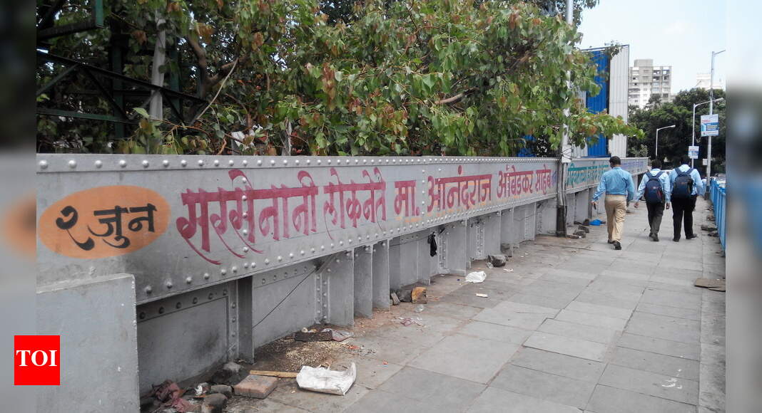 FRESHLY PAINTED TILAK BRIDGE DEFACED - Times of India