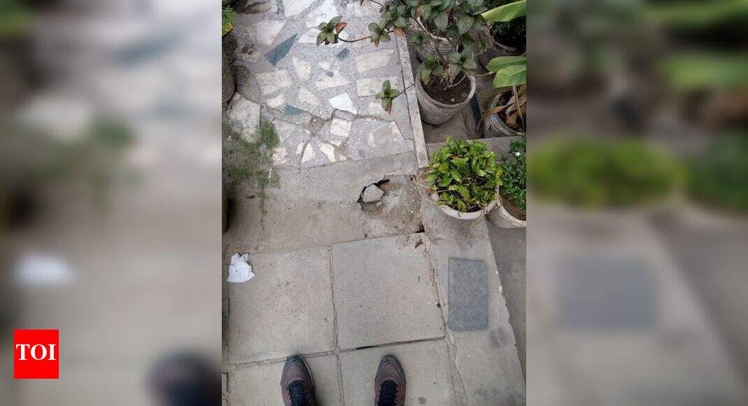 Dangerous footpath - Times of India