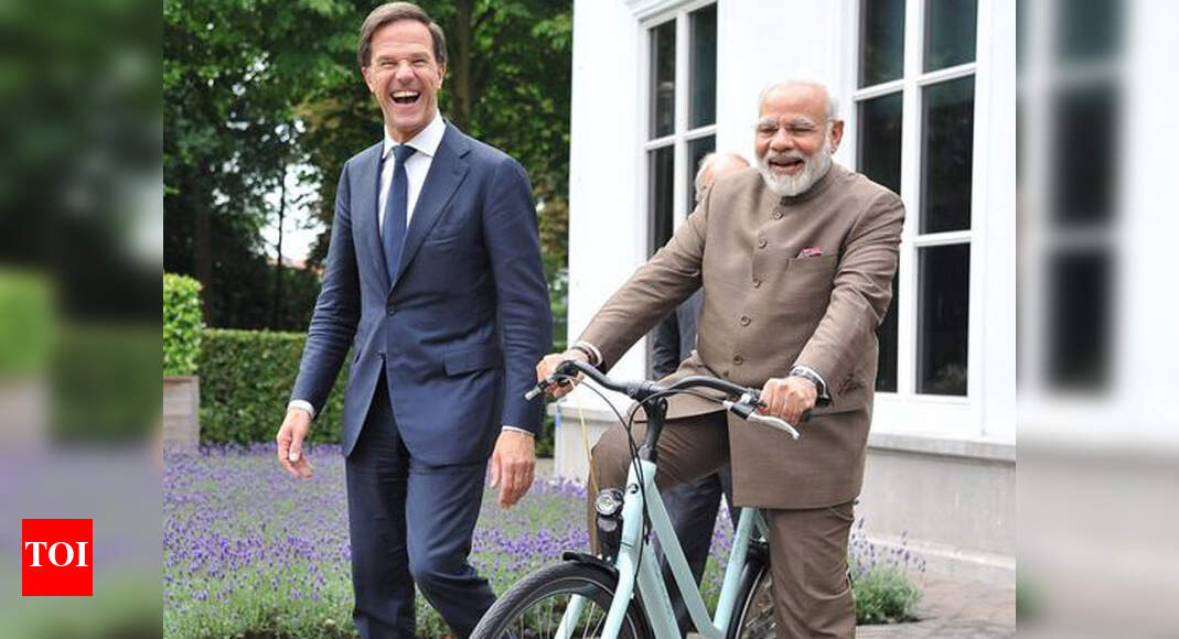 PM Modi In Netherlands: Dutch PM gifts bicycle to PM Modi | India News ...
