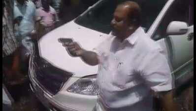P C George MLA points pistol at workers | Kozhikode News - Times of India