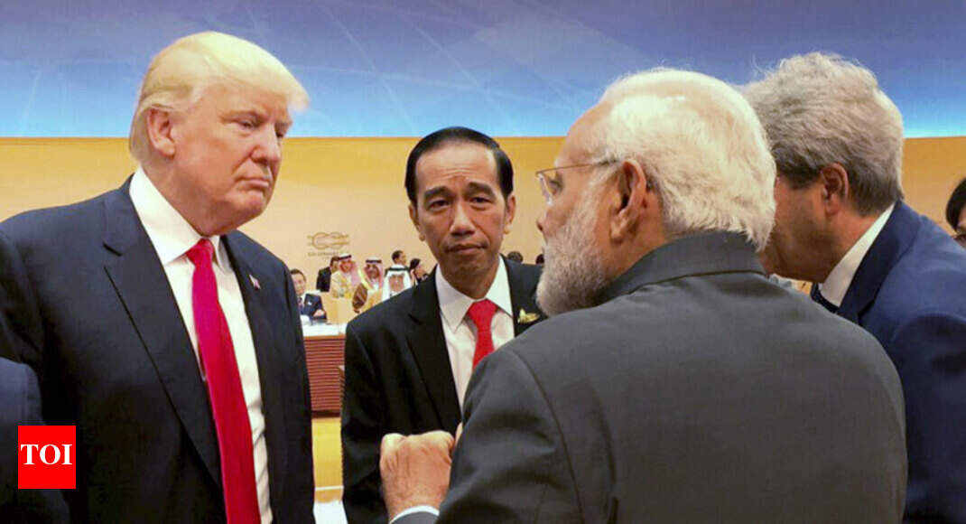 G-20 summit: US President Donald Trump walks up to PM Narendra Modi for ...