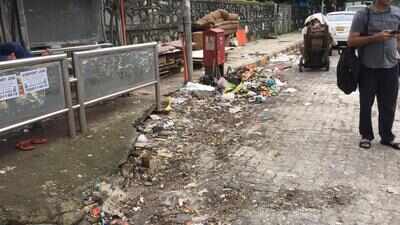 Garbage At Irla Bus Stop , - Times of India