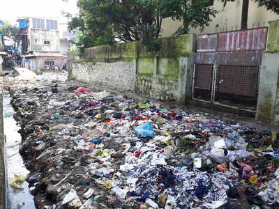 Garbage dumping near School - Times of India