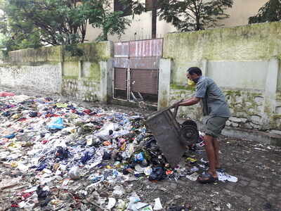 Garbage dumping near School - Times of India